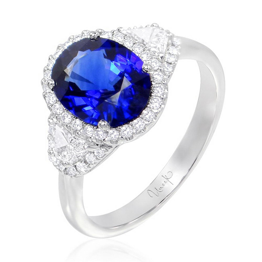 Uneek Three-Stone Oval Blue Sapphire and Trap Cut Diamond Halo Ring – A ...